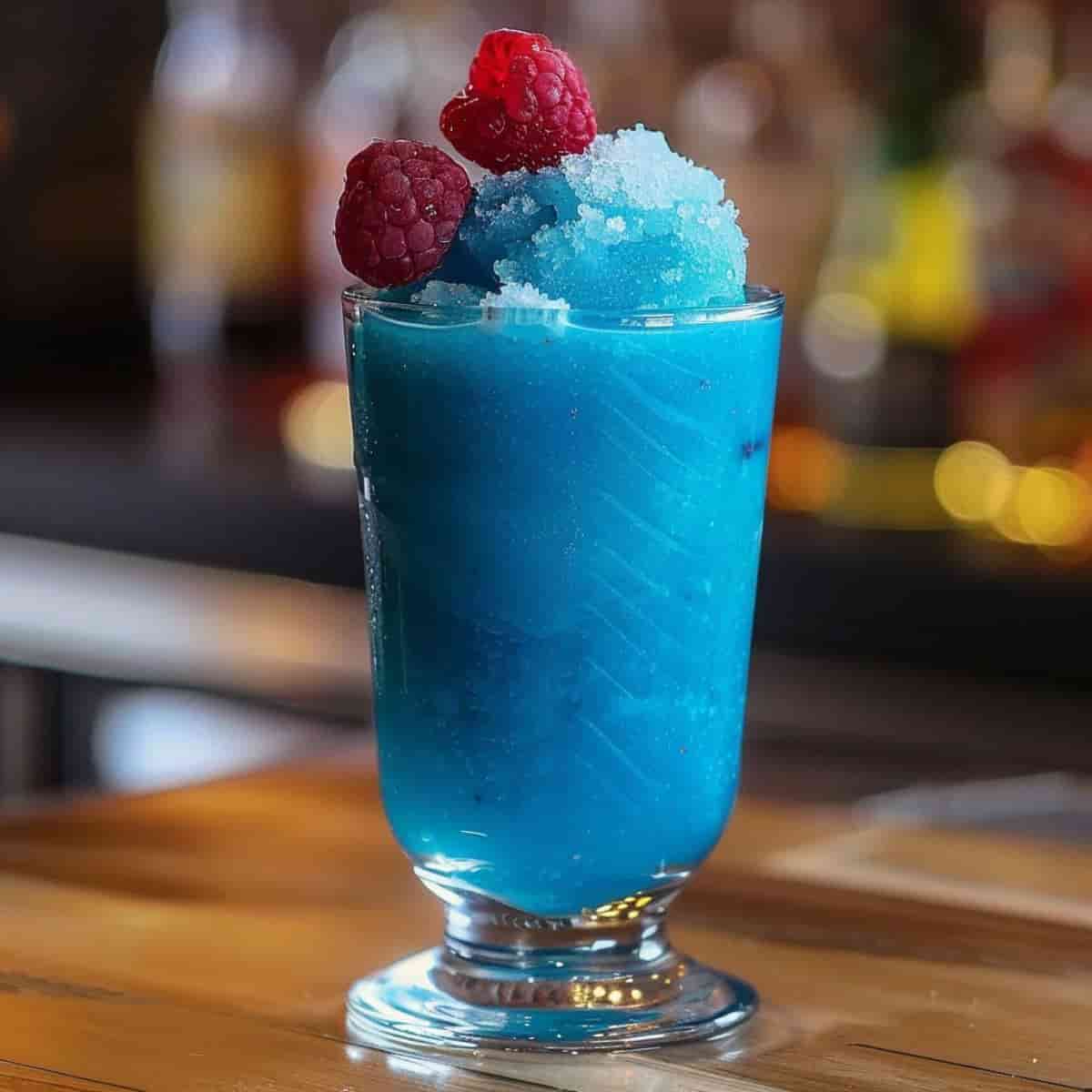 Icy Blue Raspberry Spiked Slush That Pops With Flavor - Foodiosity