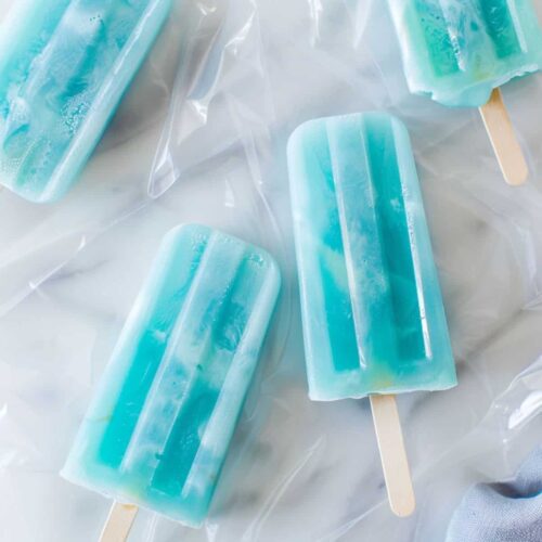 Blue Lagoon Popsicles for a Cool, Tropical Treat - Foodiosity